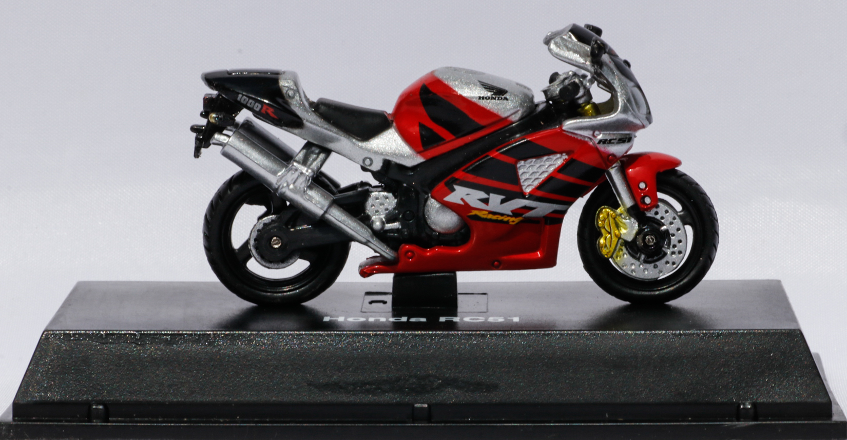 New-Ray 1-32 scale Honda motorcycles